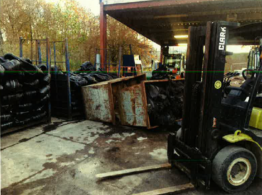 Tyre giant Pirelli workers placed skips on stacks of tyres to crush ...
